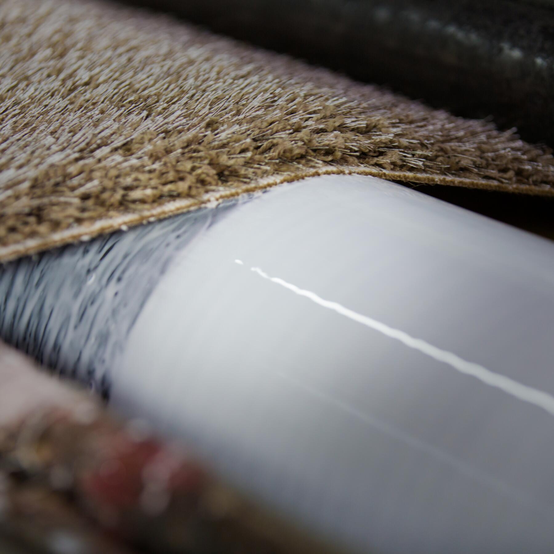 Back coating machine for woven carpets | Bejimac